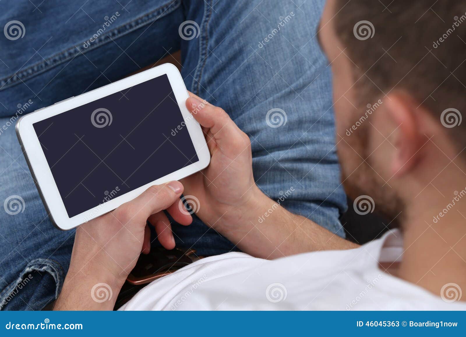 Young Man Using Internet on His Tablet Computer Stock Image - Image of ...