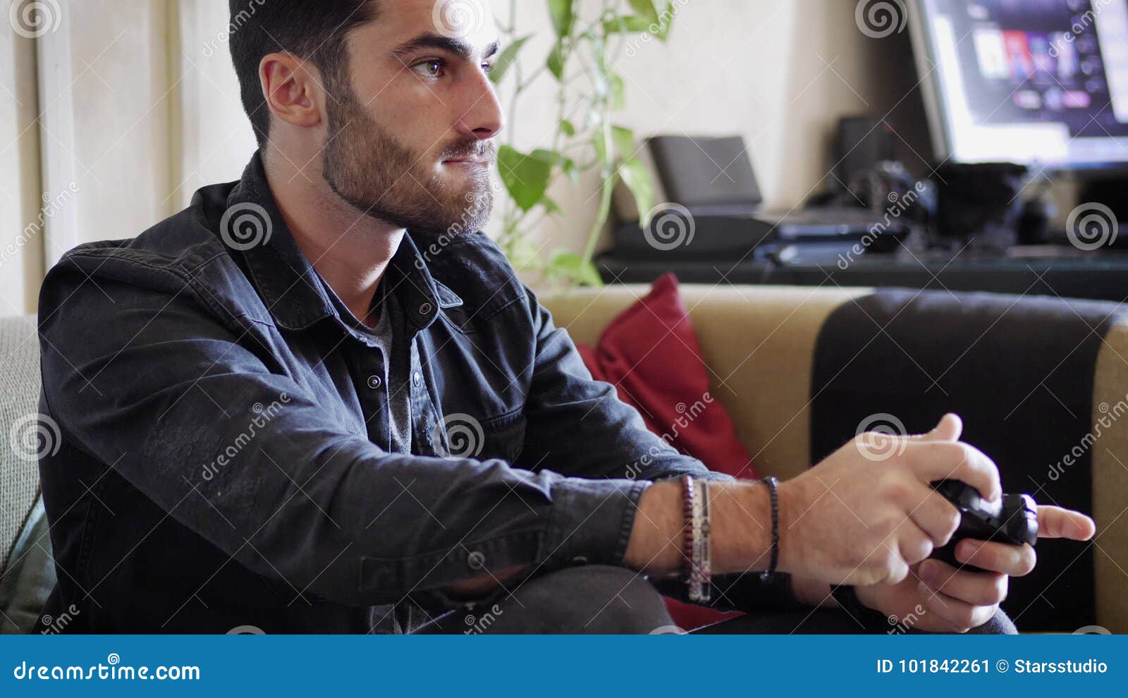 Young Man Using Joystick or Joypad for Videogames Stock Image - Image ...