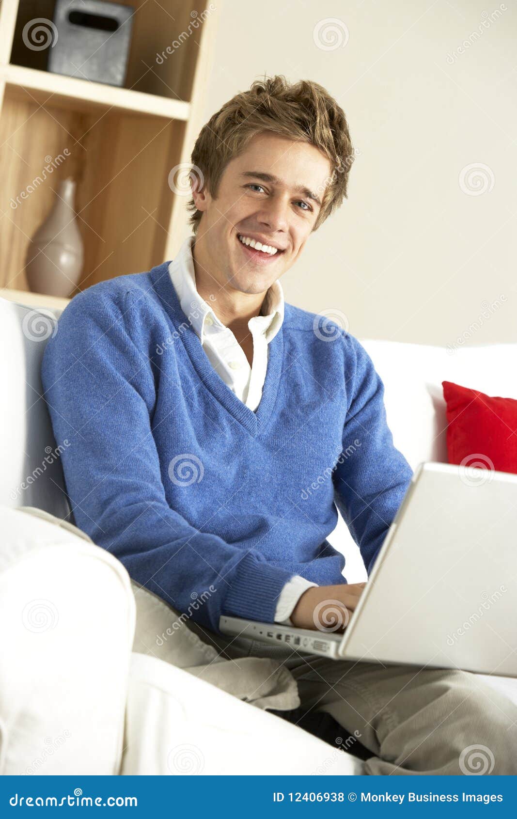 Young Man Using Laptop stock photo. Image of caucasian - 12406938
