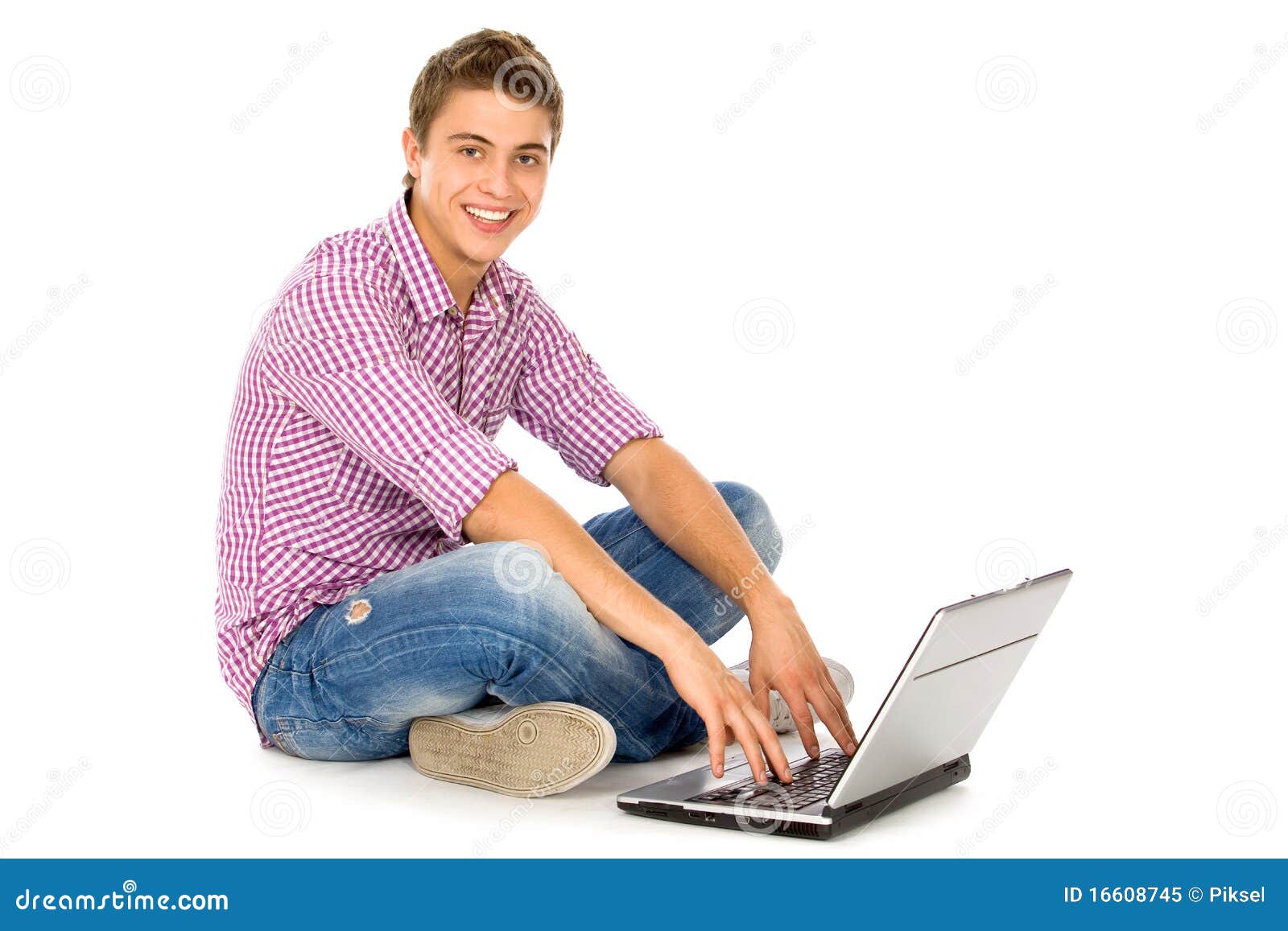 Young man using laptop stock image. Image of isolated - 16608745