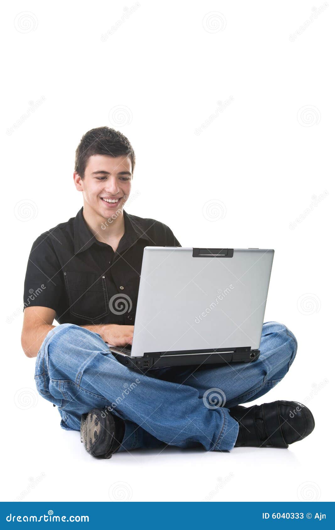 Young Man Using a Laptop stock image. Image of lifestyle - 6040333