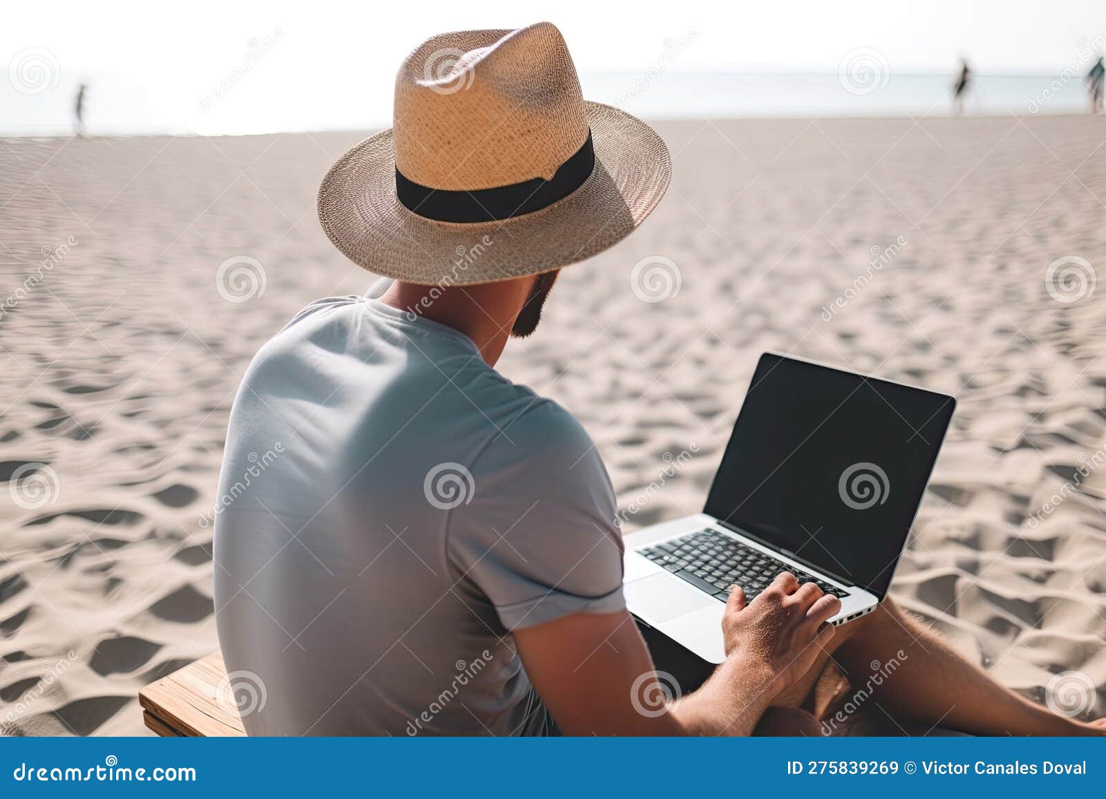 Young Man Using Laptop Computer on a Beach. Freelance Work Concept ...