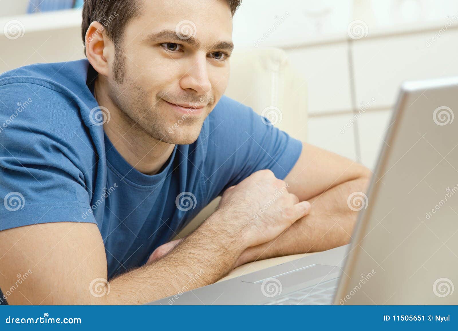 Young Man Using Laptop at Home Stock Image - Image of email, browsing ...