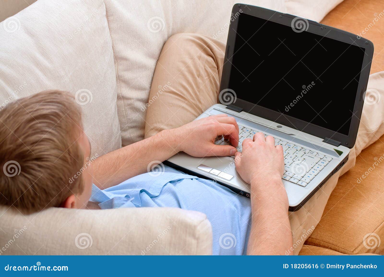 Young Man Using a Laptop at Home Stock Photo - Image of internet ...