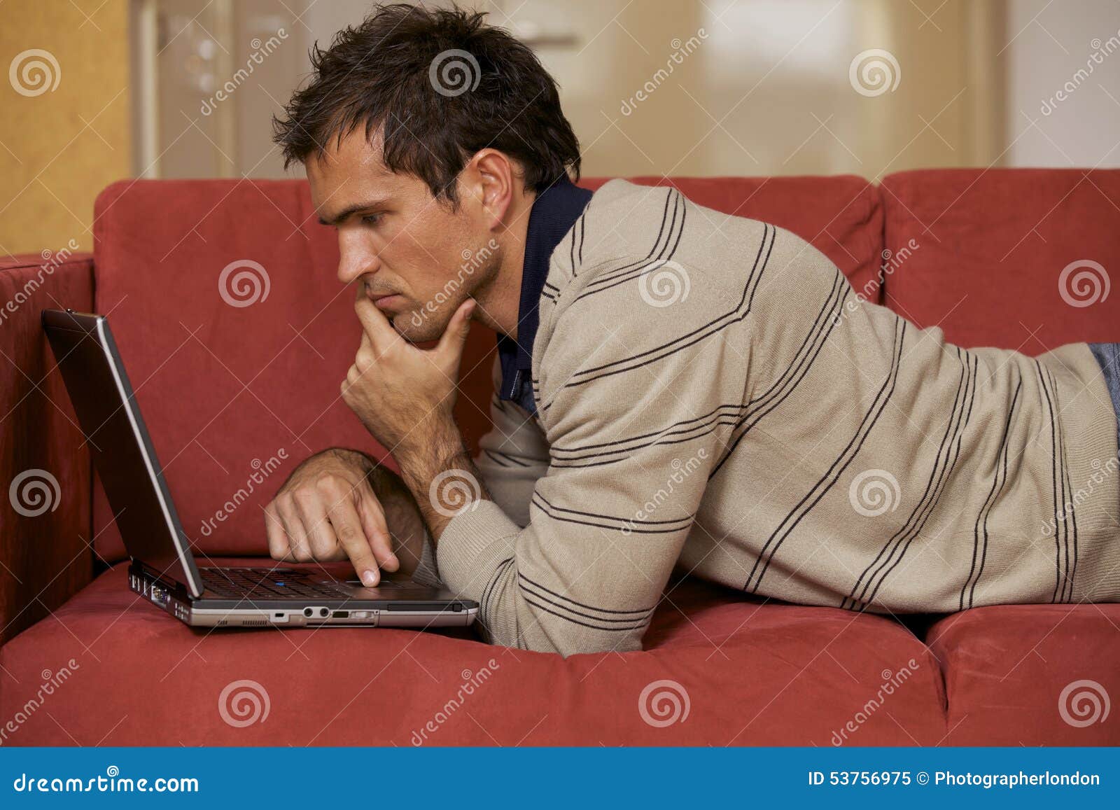 Young man using laptop stock image. Image of 2029, side - 53756975