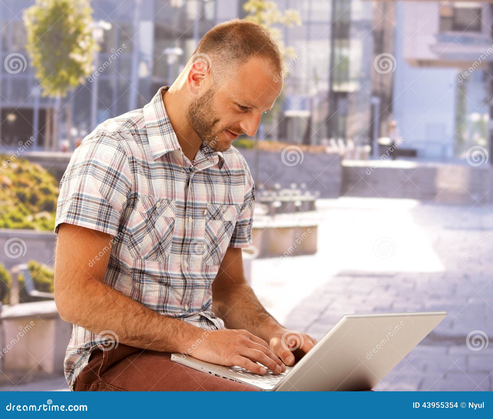 Young Man Using Laptop Outdoors Stock Photo - Image of people, online ...