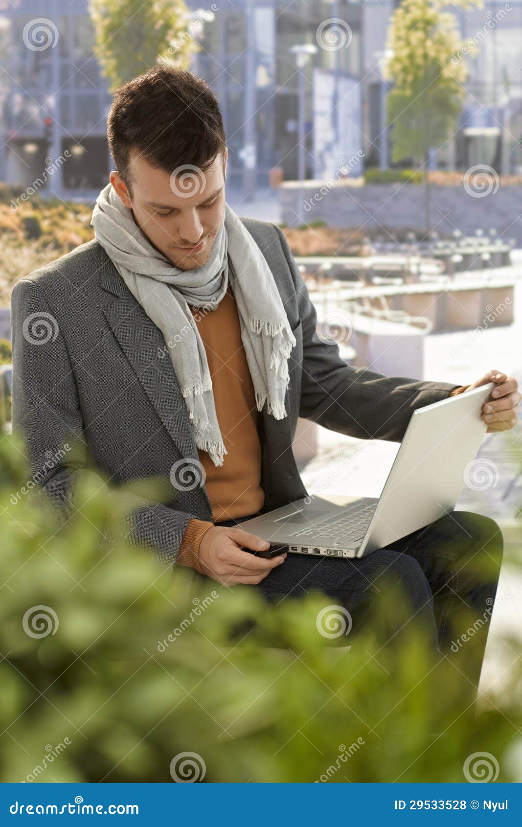 Young Man Using Laptop in Park Stock Photo - Image of businessman ...