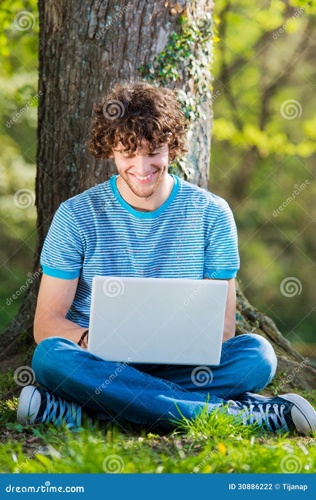 Young man in using laptop stock photo. Image of chat - 30886222