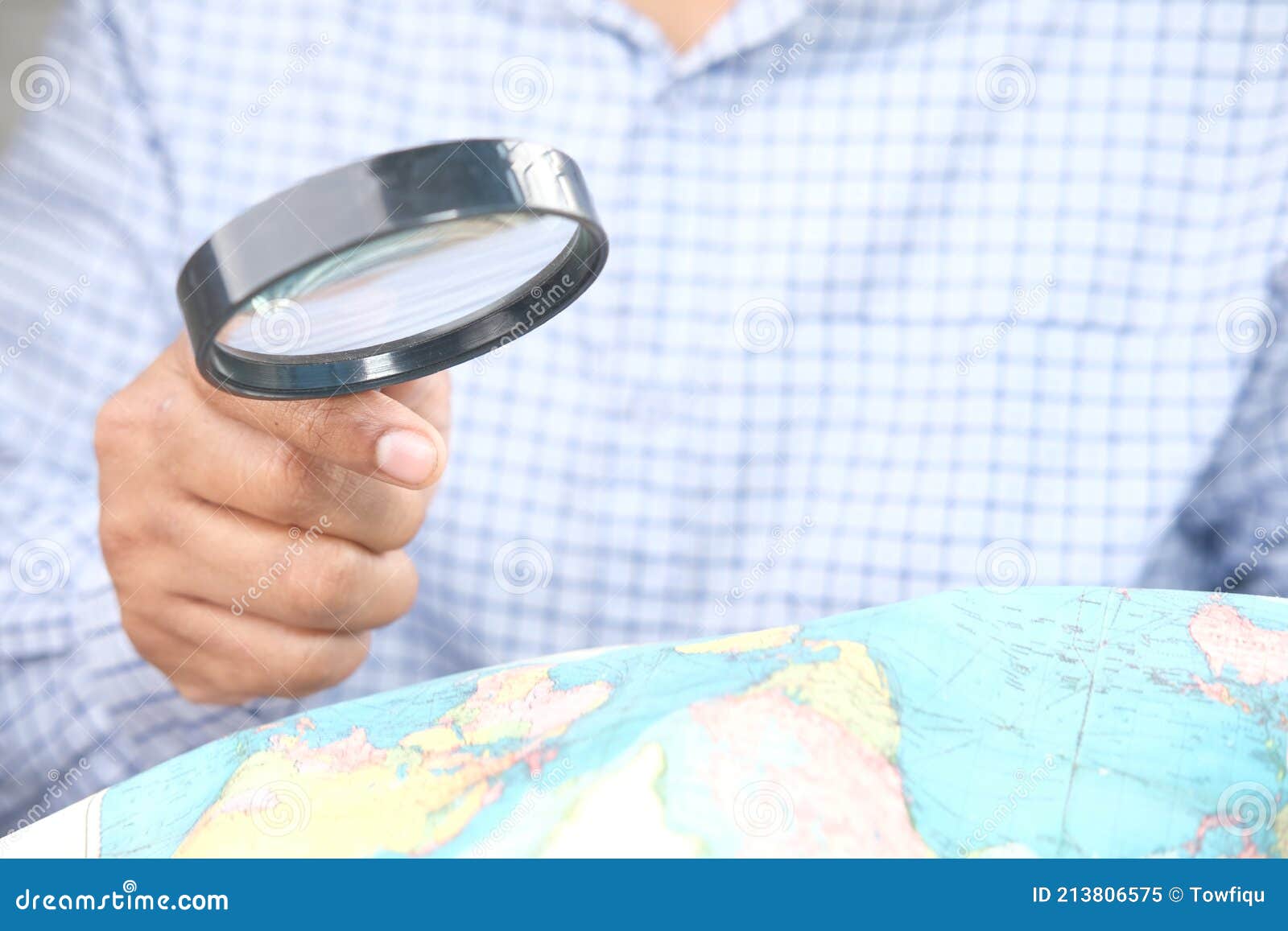 Young Man Using Magnifying Glass Looking Something on Map Stock Image ...