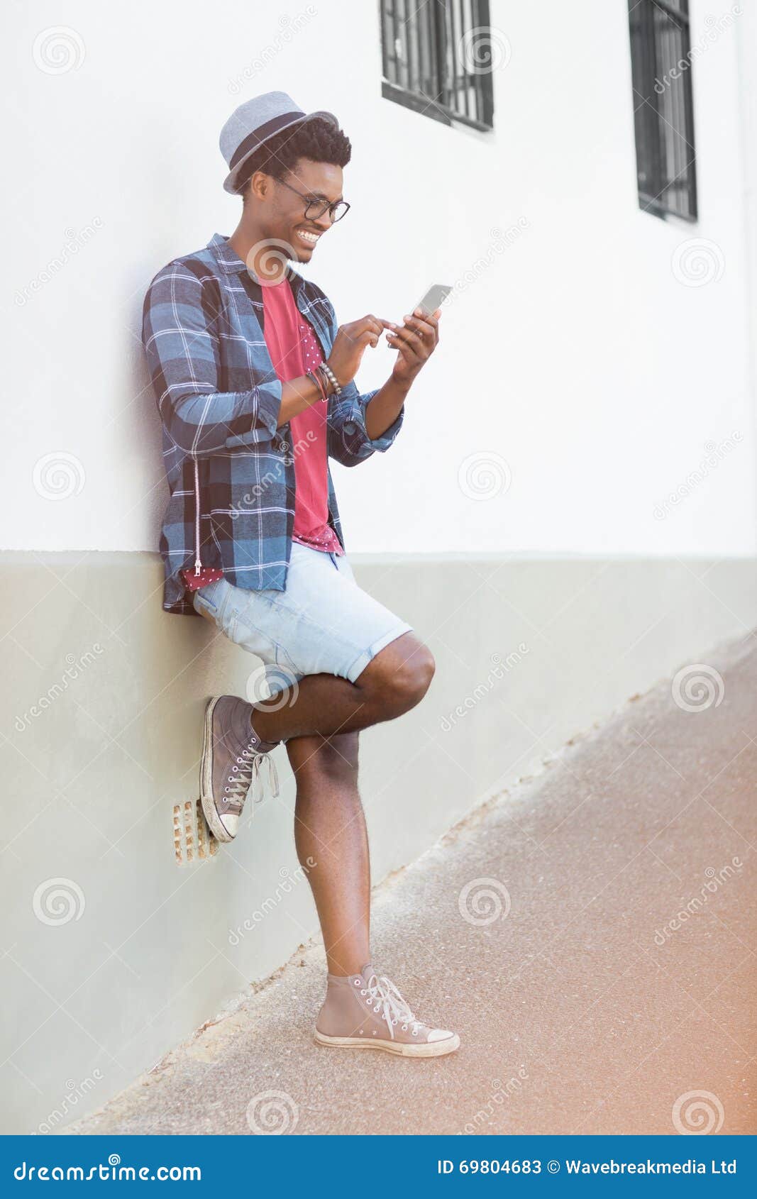 Young Man Using Mobile Phone Stock Image - Image of cheerful ...