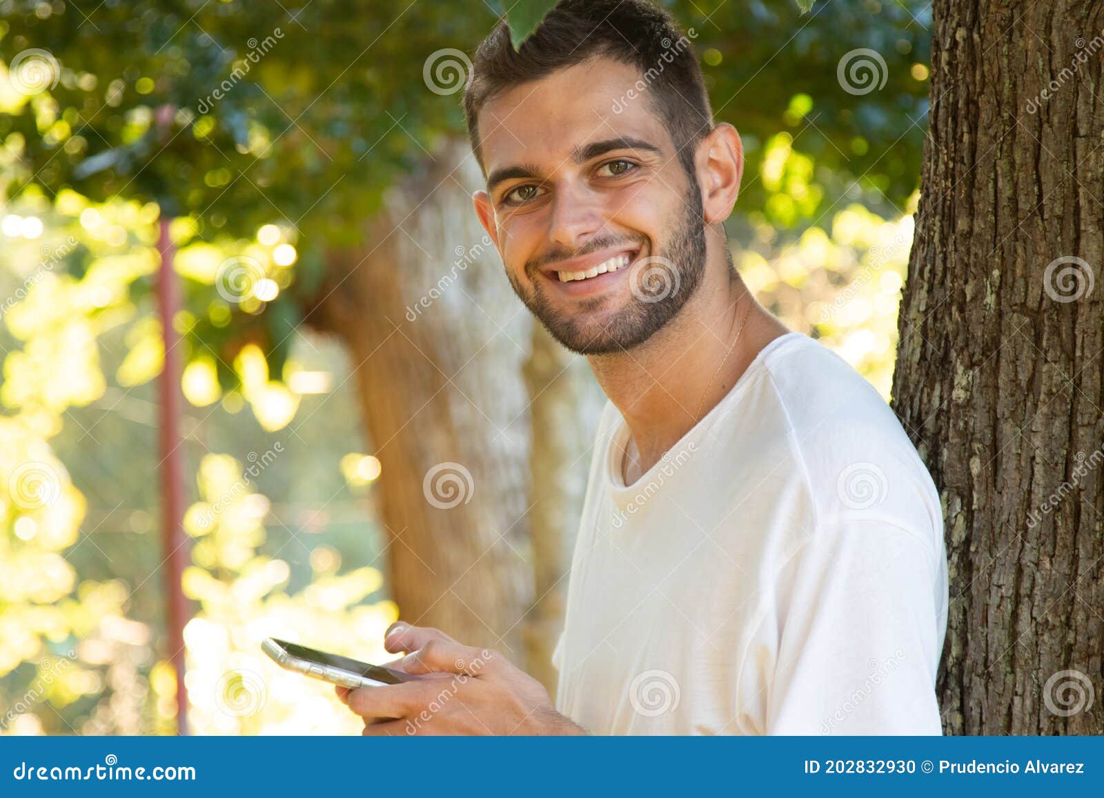 Man Using Mobile Phone Outdoors Stock Photo - Image of smiling ...