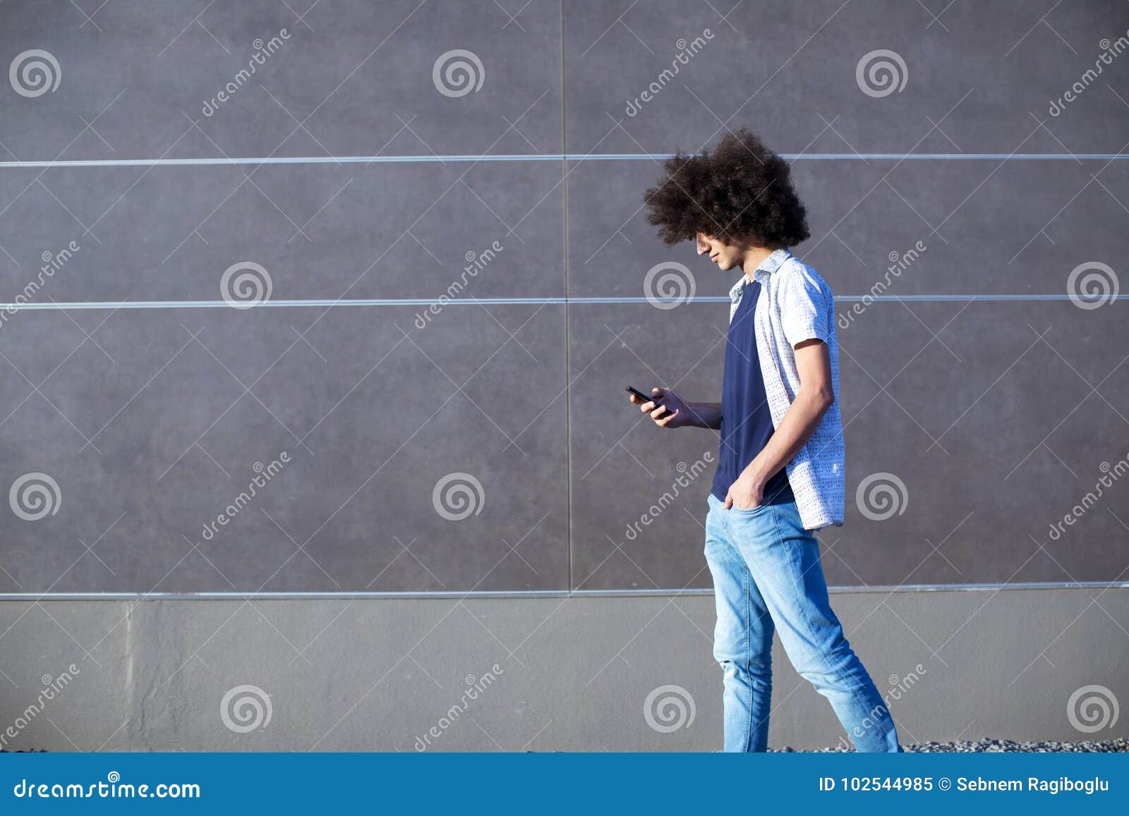 Young Man Using Mobile Phone on Street Stock Image - Image of people ...