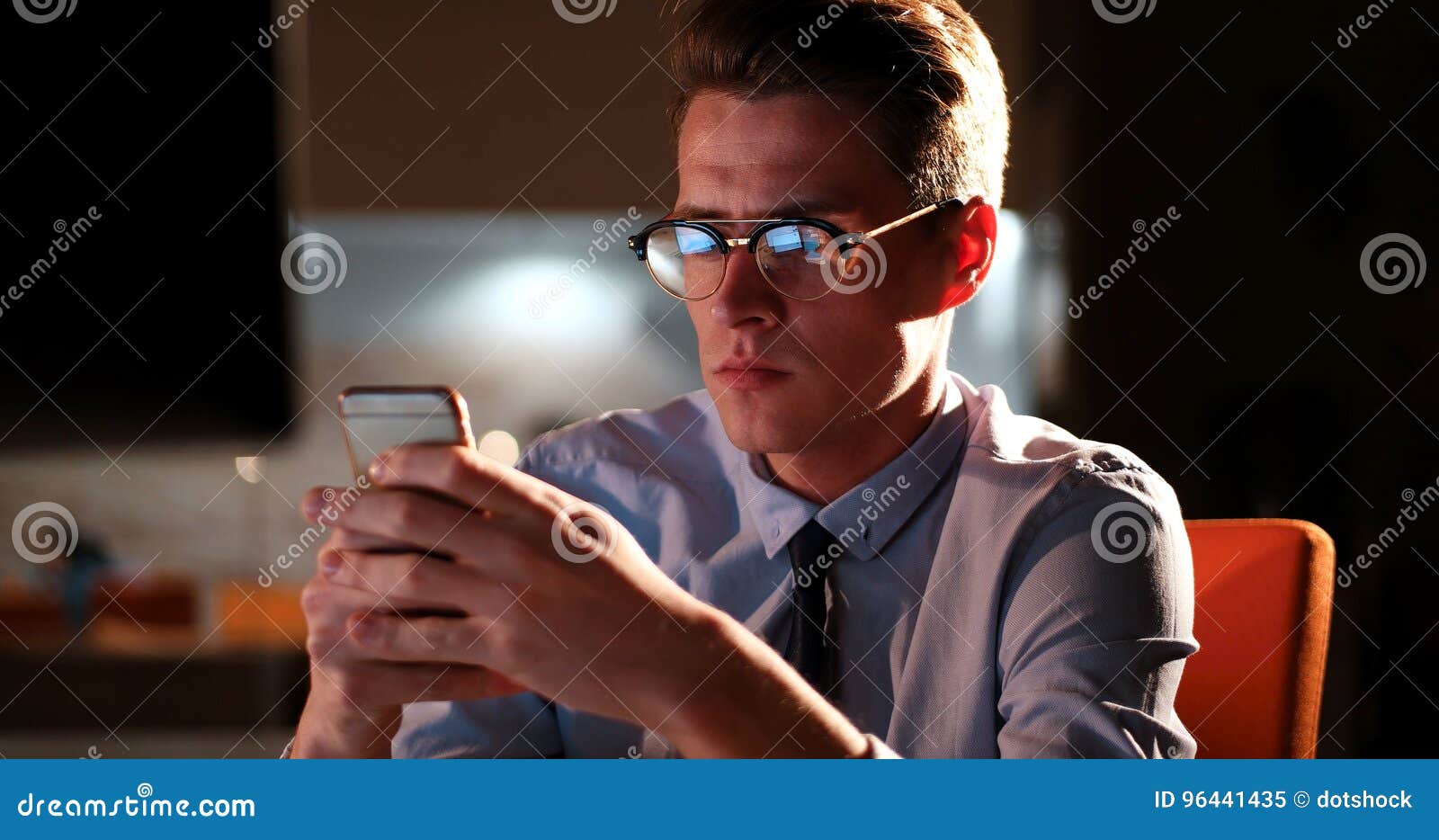 Man Using Mobile Phone in Dark Office Stock Image - Image of busy ...