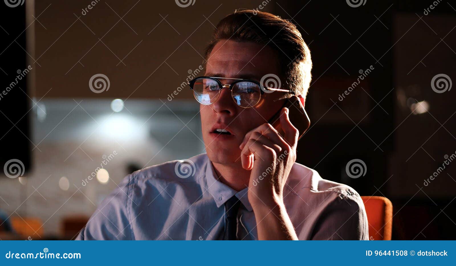 Man Using Mobile Phone in Dark Office Stock Photo - Image of design ...