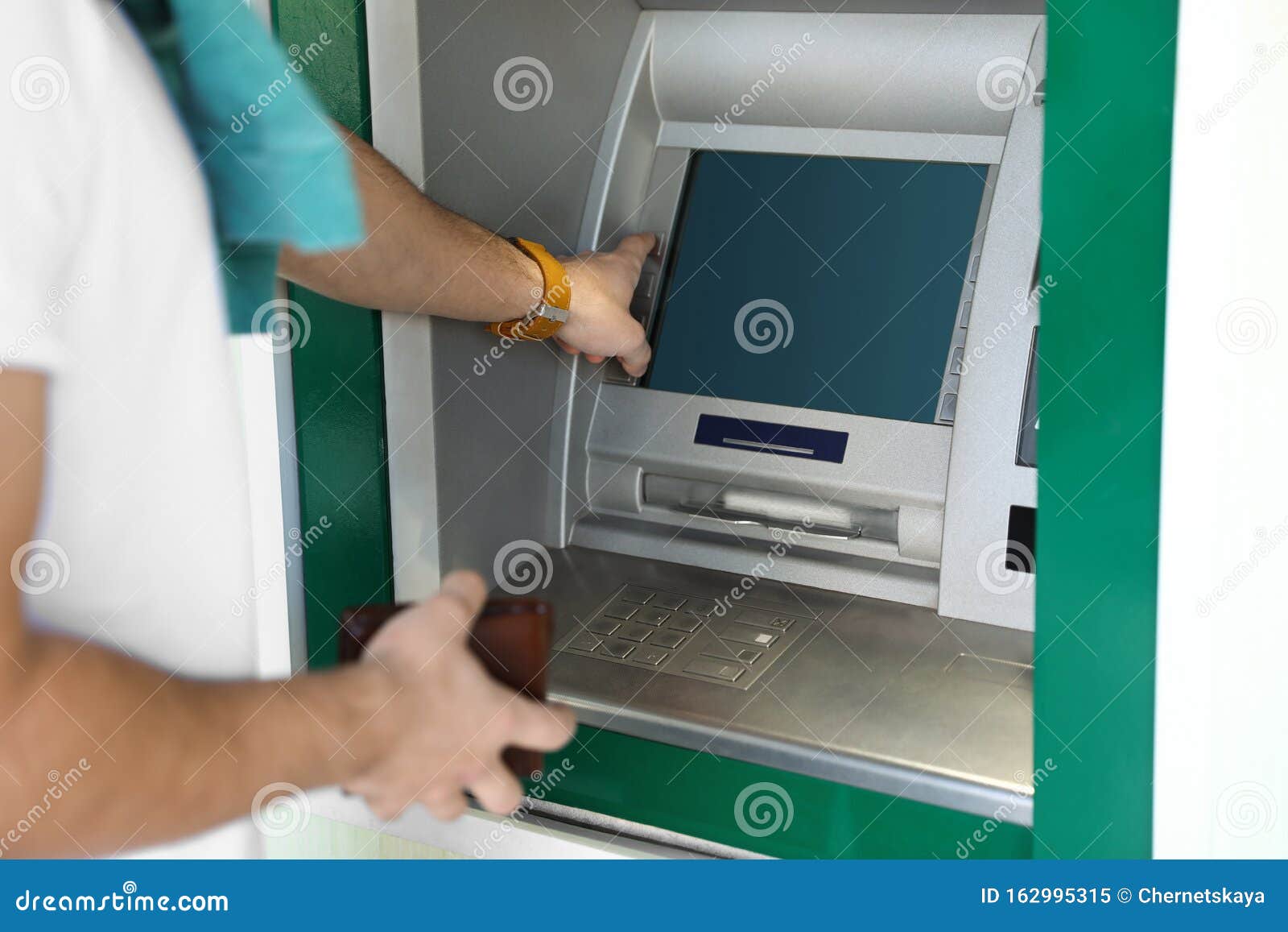 Young Man Using Modern Cash Machine Outdoors Stock Image - Image of ...