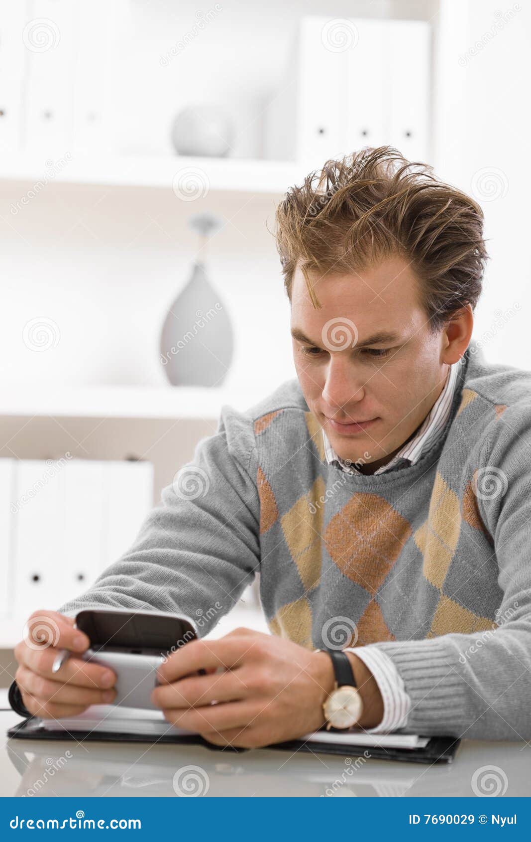 Young man using phone stock image. Image of chatting, european - 7690029