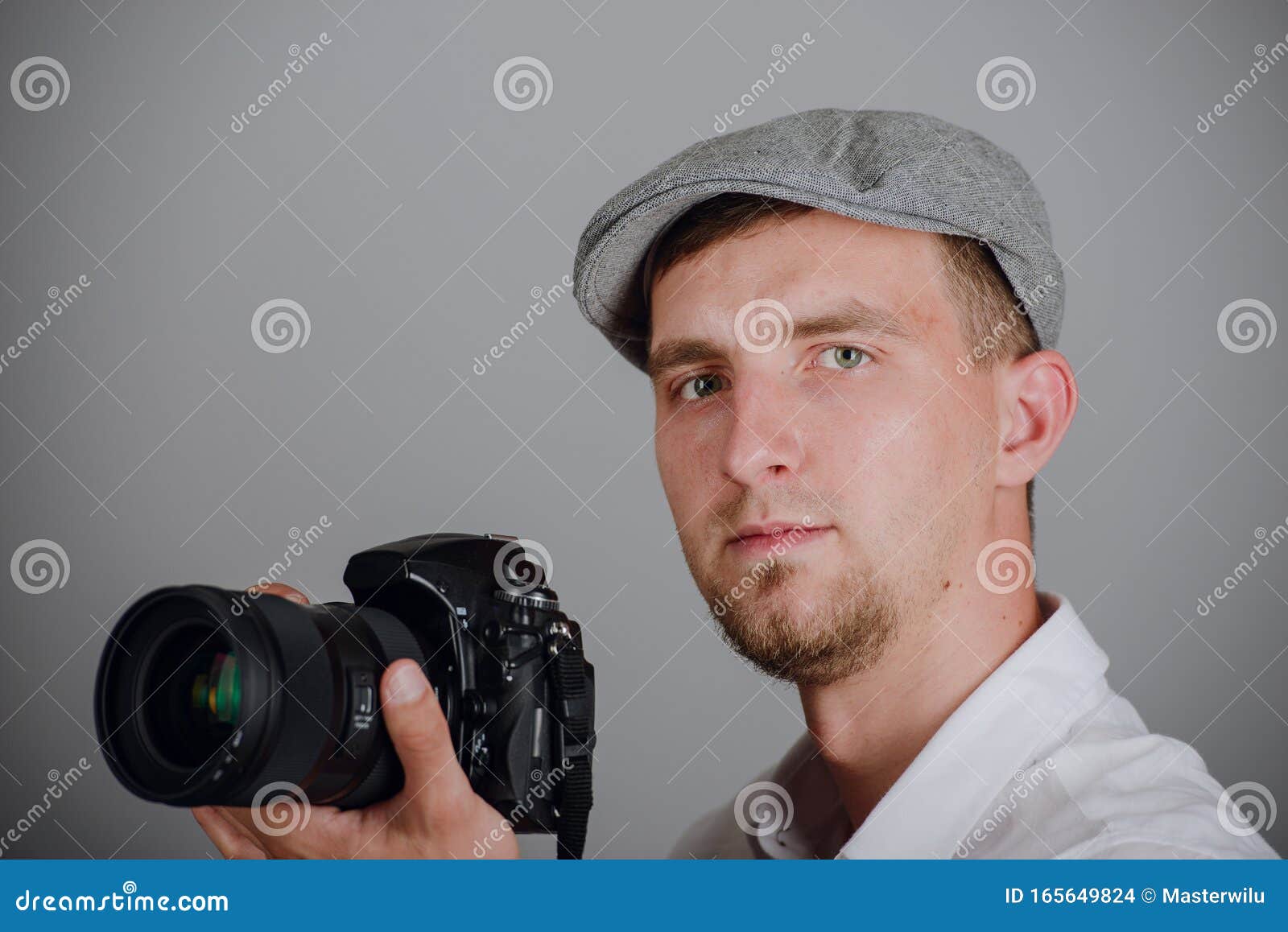 Young Man Using a Professional Camera Stock Photo - Image of young ...