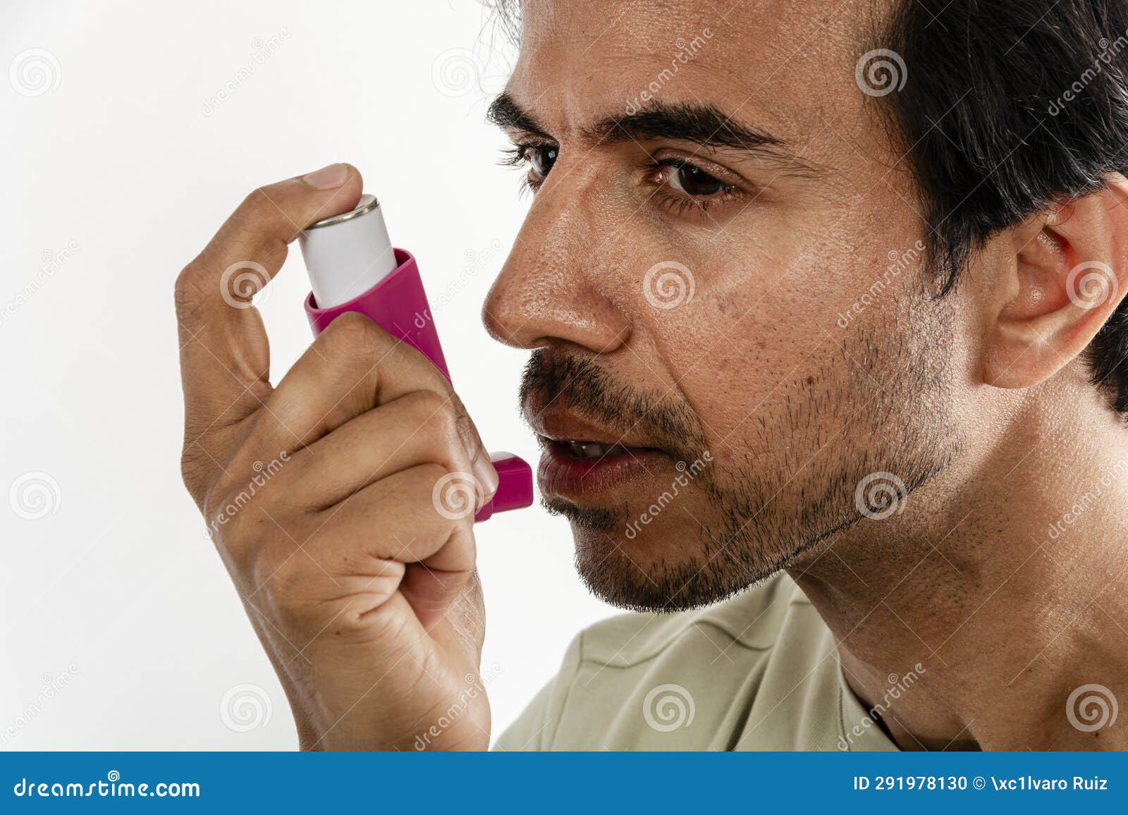 Young Man Using a Respiratory Inhaler. Stock Photo - Image of breathe ...