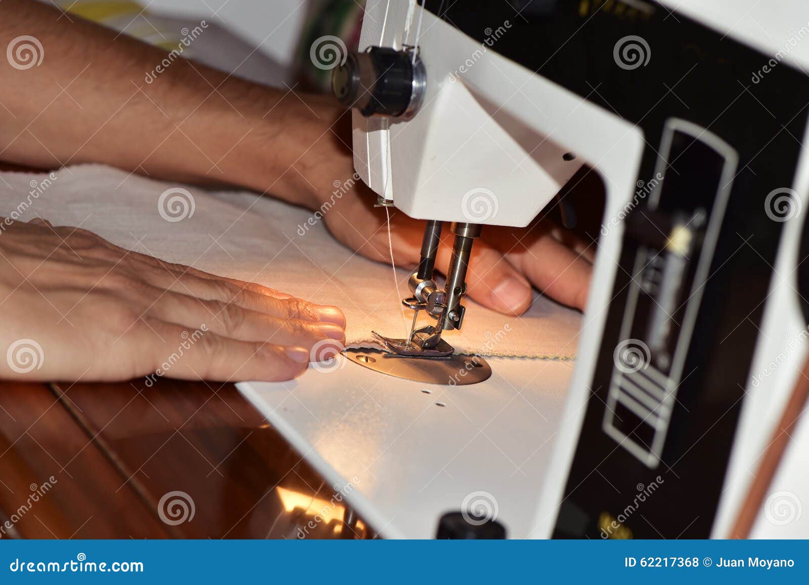 Young Man Using a Sewing Machine Stock Photo - Image of machine ...
