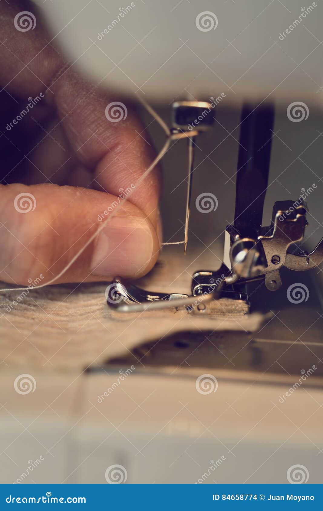 Young Man Using a Sewing Machine Stock Photo - Image of chores ...
