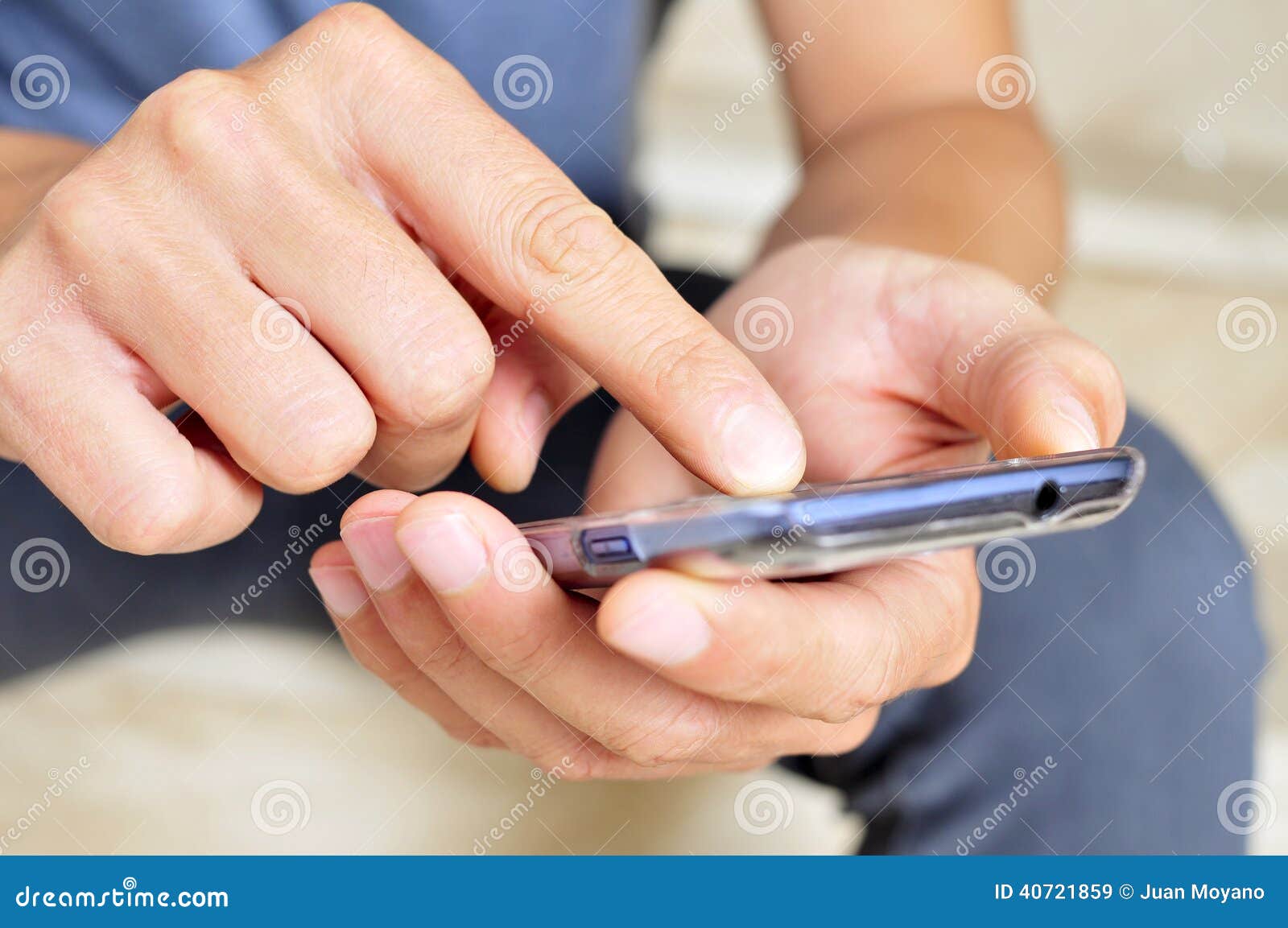 Young Man Using a Smartphone Stock Image - Image of people, horizontal ...