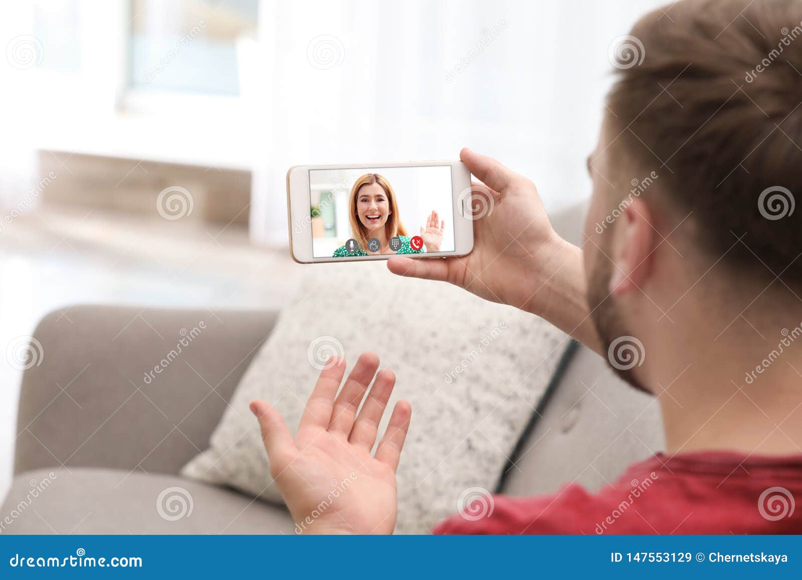 Young Man Using Smartphone for Conversation with Girlfriend Via Video ... Young Man Using Smartphone for Conversation with Girlfriend Via Video ...