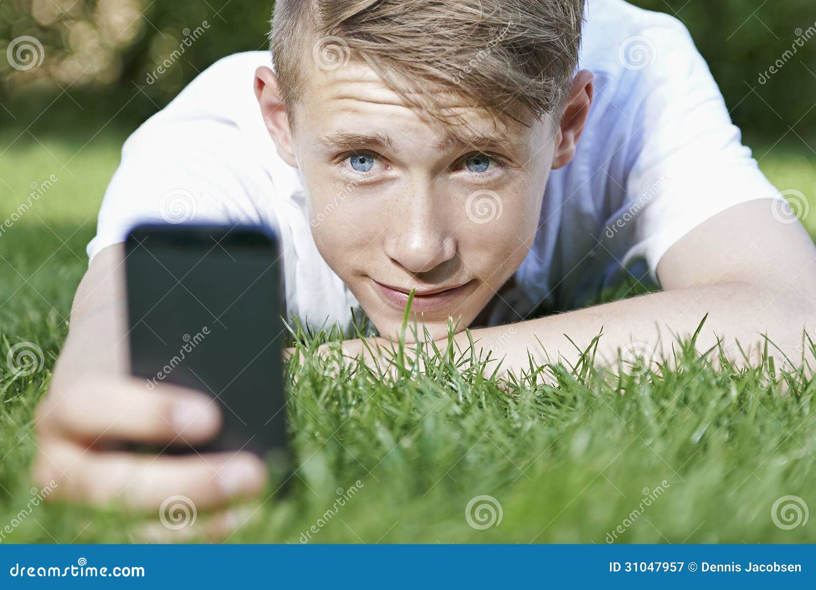 Young Man Using a Smartphone Stock Image - Image of mobile, online ...
