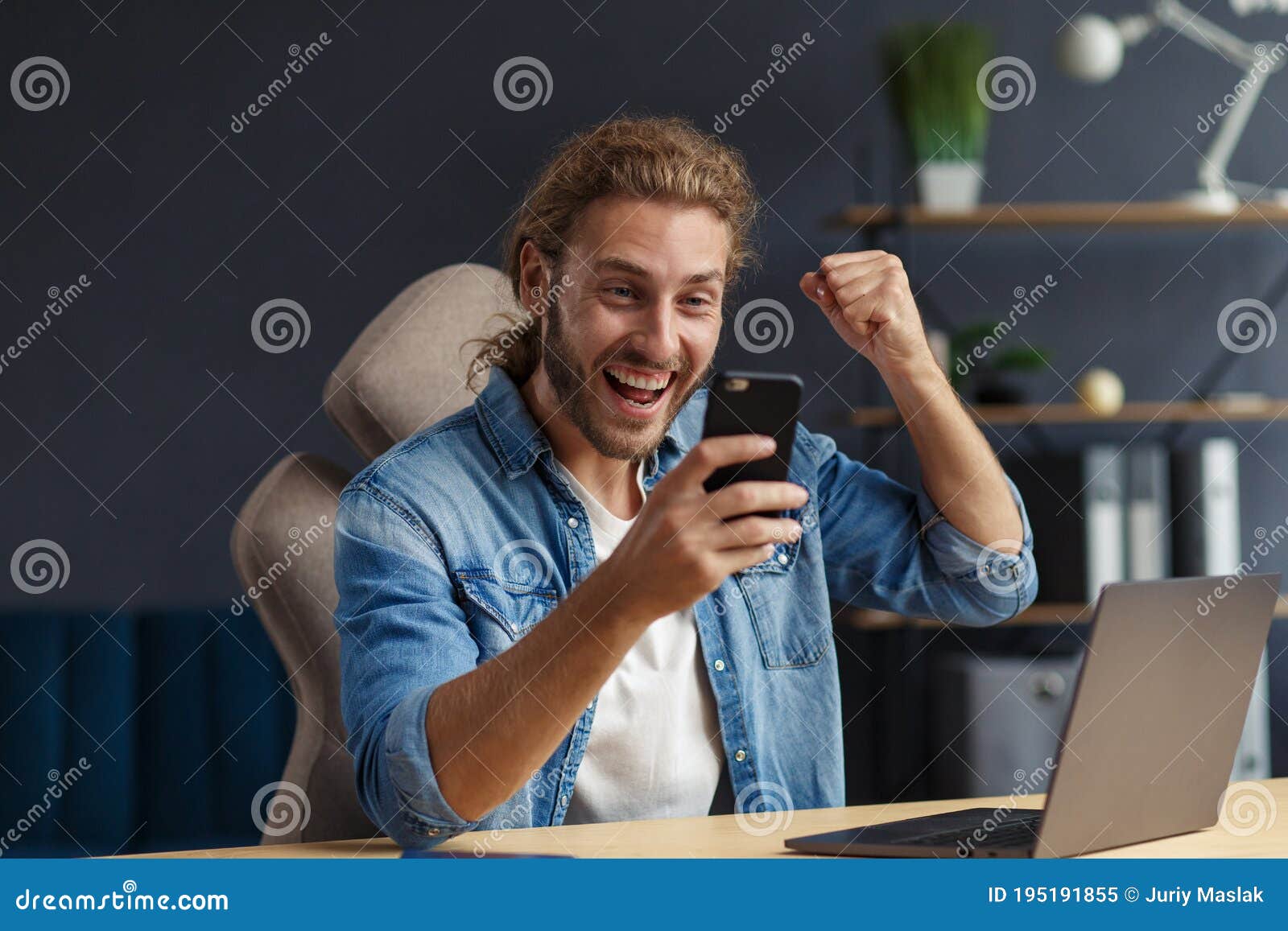 Young Man Using Smartphone and Smiling. Happy Businessman Using Mobile ...
