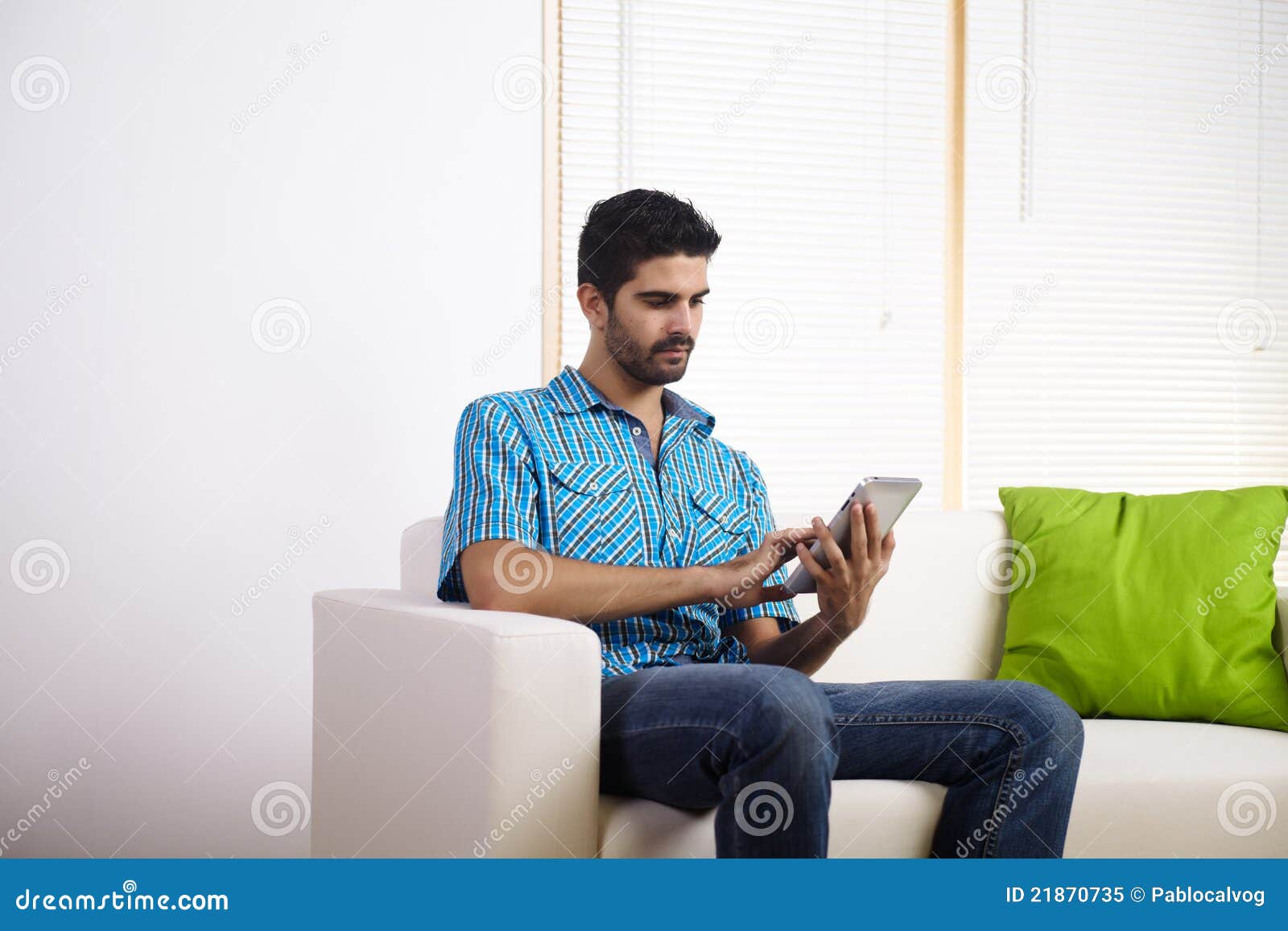 Young Man Using a Tablet PC Stock Image - Image of casual, holding ...