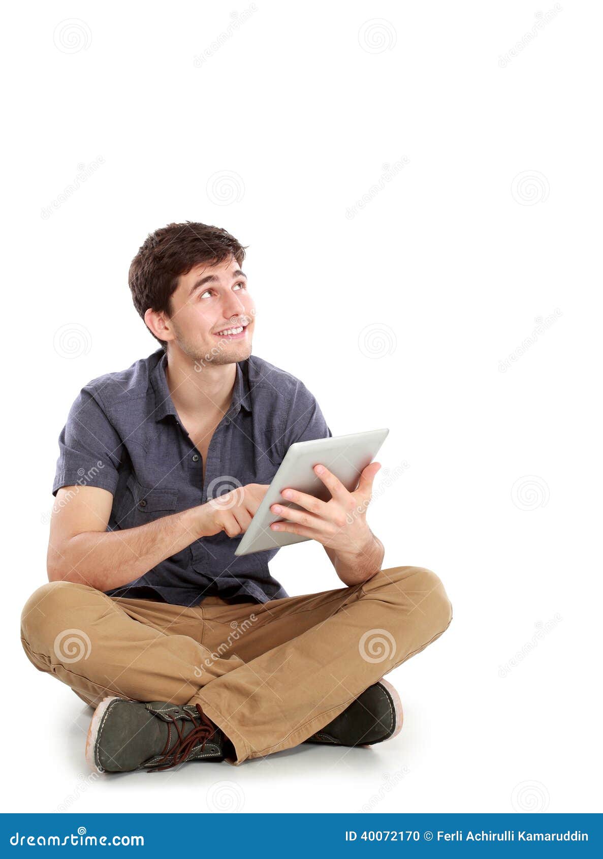 Young man using tablet pc stock photo. Image of concept - 40072170