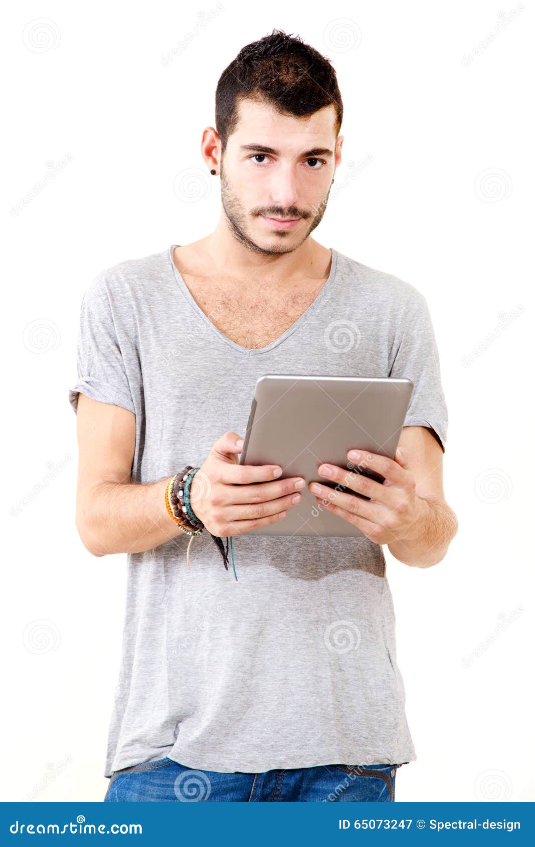 Young man using tablet stock image. Image of portable - 65073247