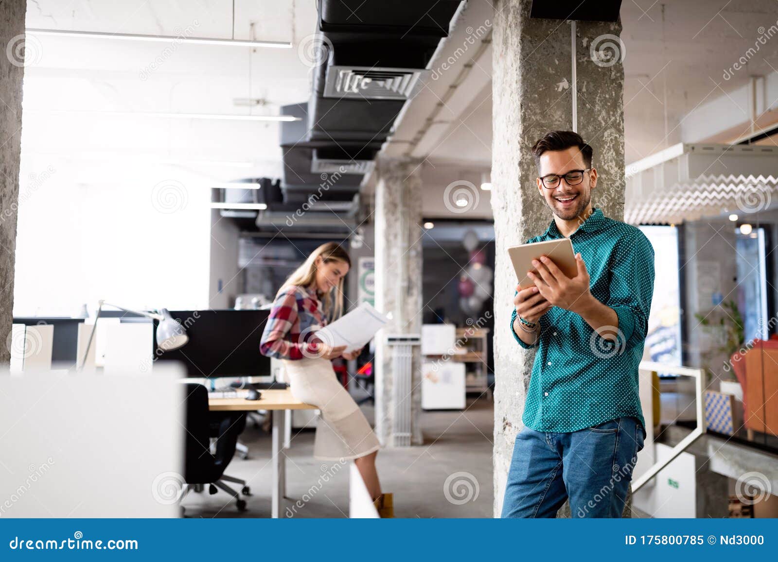 Young Man Using Technology, Digital Tablet in Corporate Business Office ...
