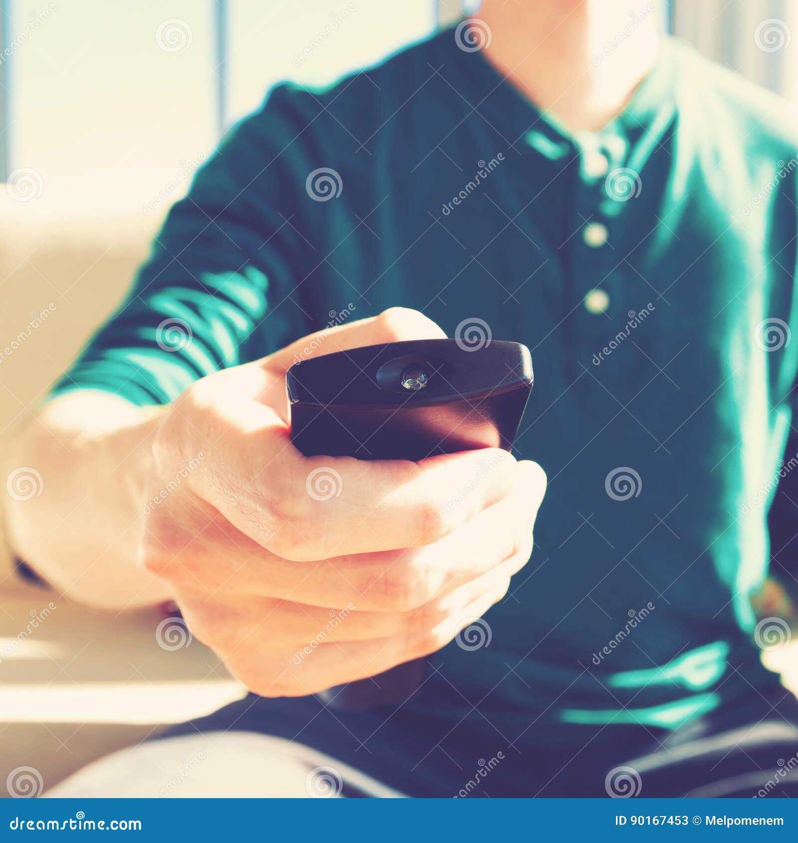 Young Man Using TV Remote Control Stock Image - Image of happy, remote ...