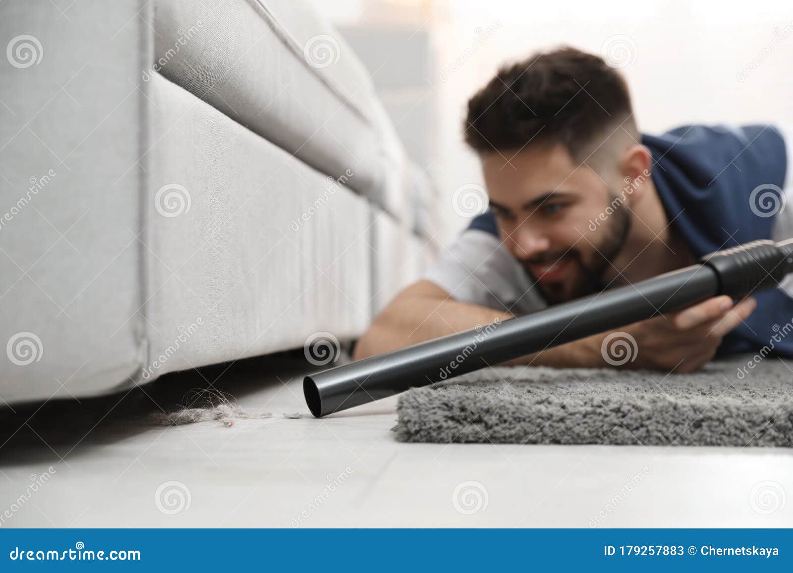 Young Man Using Vacuum Cleaner Stock Image - Image of cleanliness ...