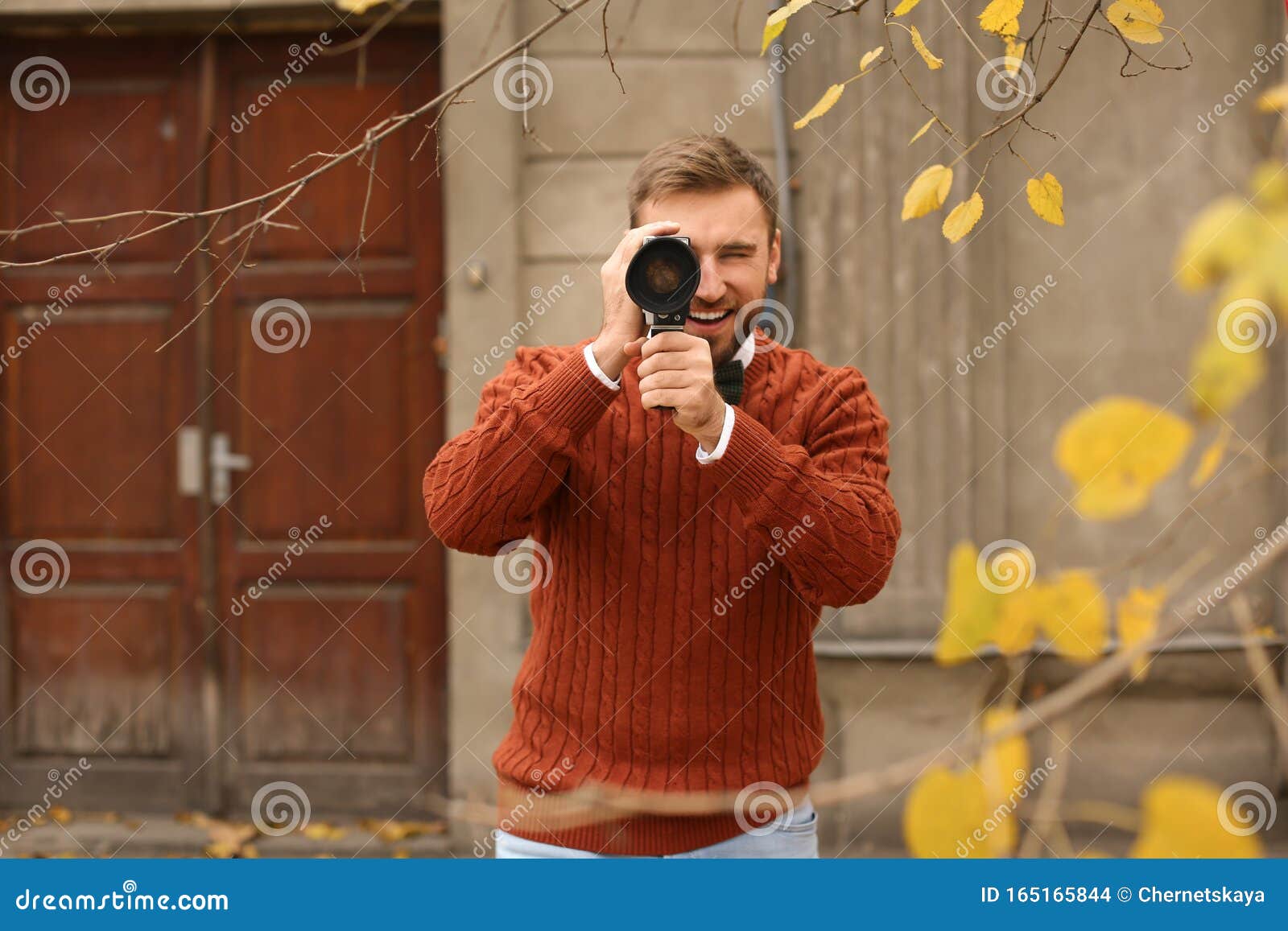 Young Man Using Vintage Video Camera Stock Photo - Image of outside ...