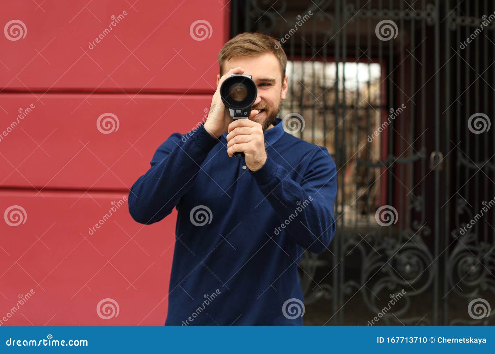 Young Man Using Vintage Video Camera Stock Photo - Image of filmmaker ...