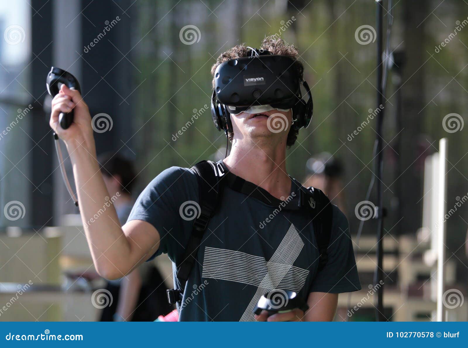 Young Man Using VR Set at Sonar Festival with Hand Handles Editorial ...