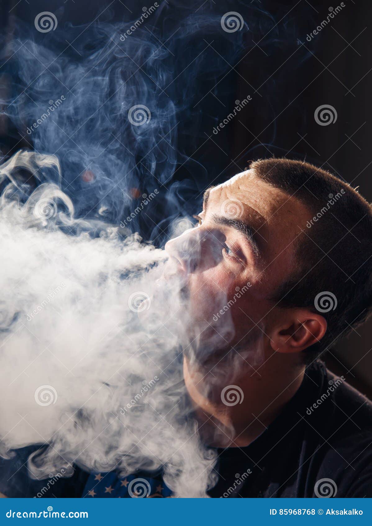 Young man vaping stock photo. Image of evening, brutal - 85968768