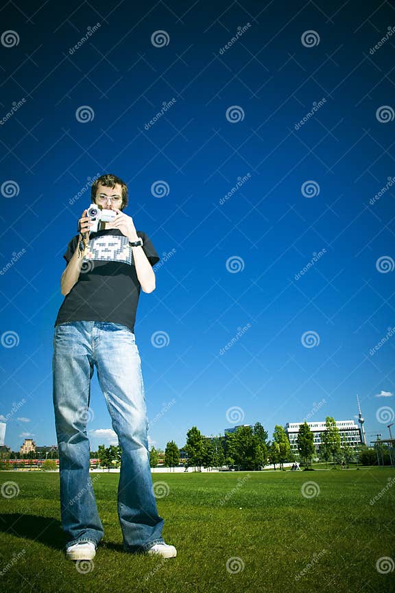 Young Man with Video Camera Stock Photo - Image of male, technology ...