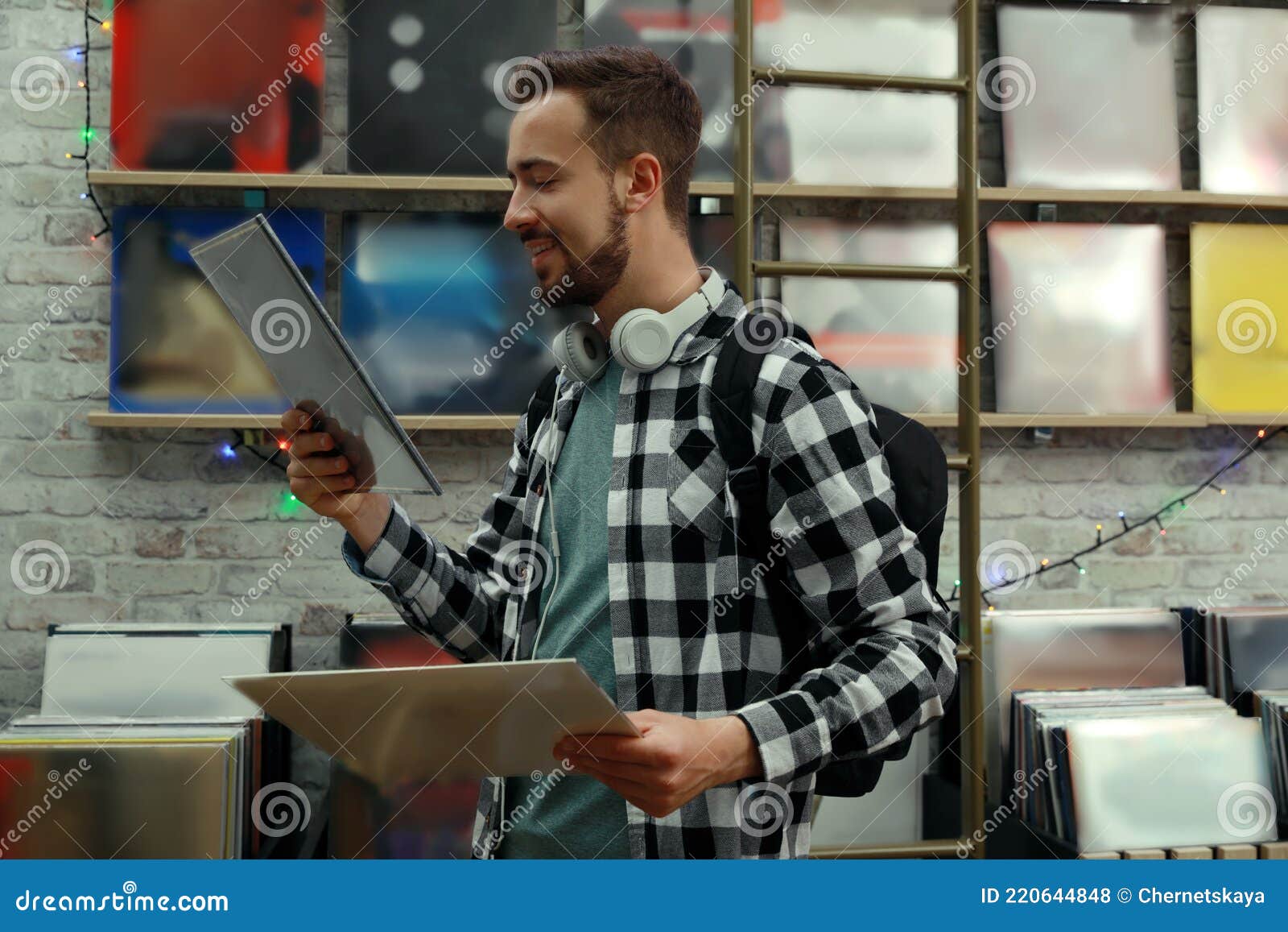 Young Man with Vinyl Records in Store Stock Photo - Image of analog ...