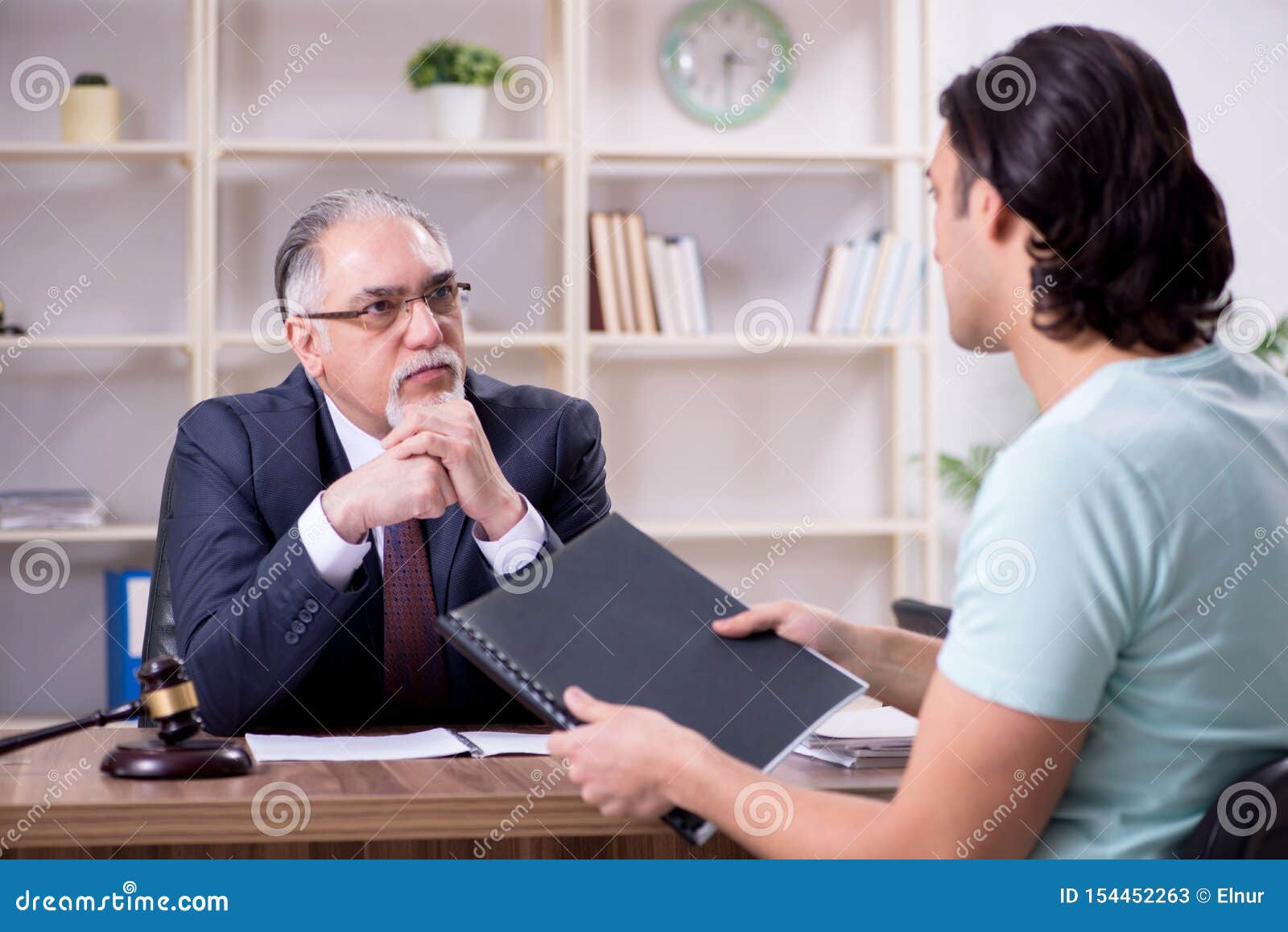 Young Man Visiting Experienced Male Lawyer Stock Image - Image of ...