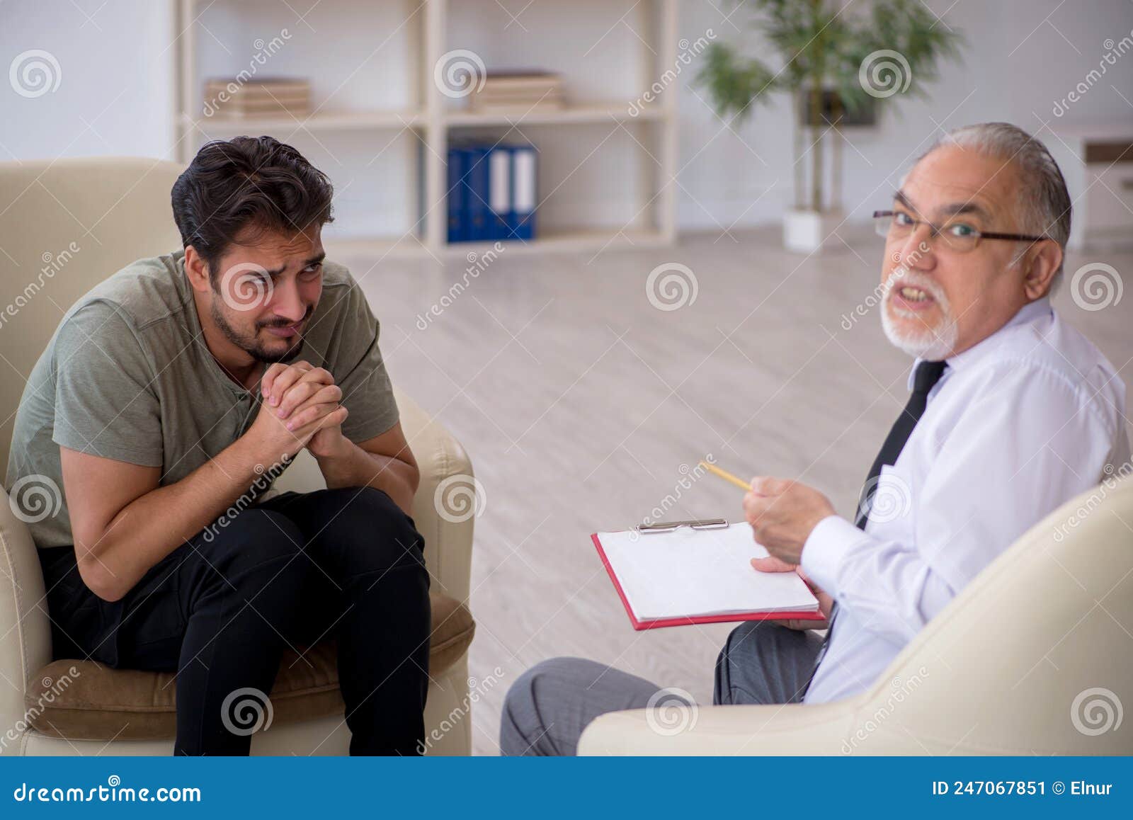 Young Man Visiting Old Psychologist Stock Image - Image of doctor ...