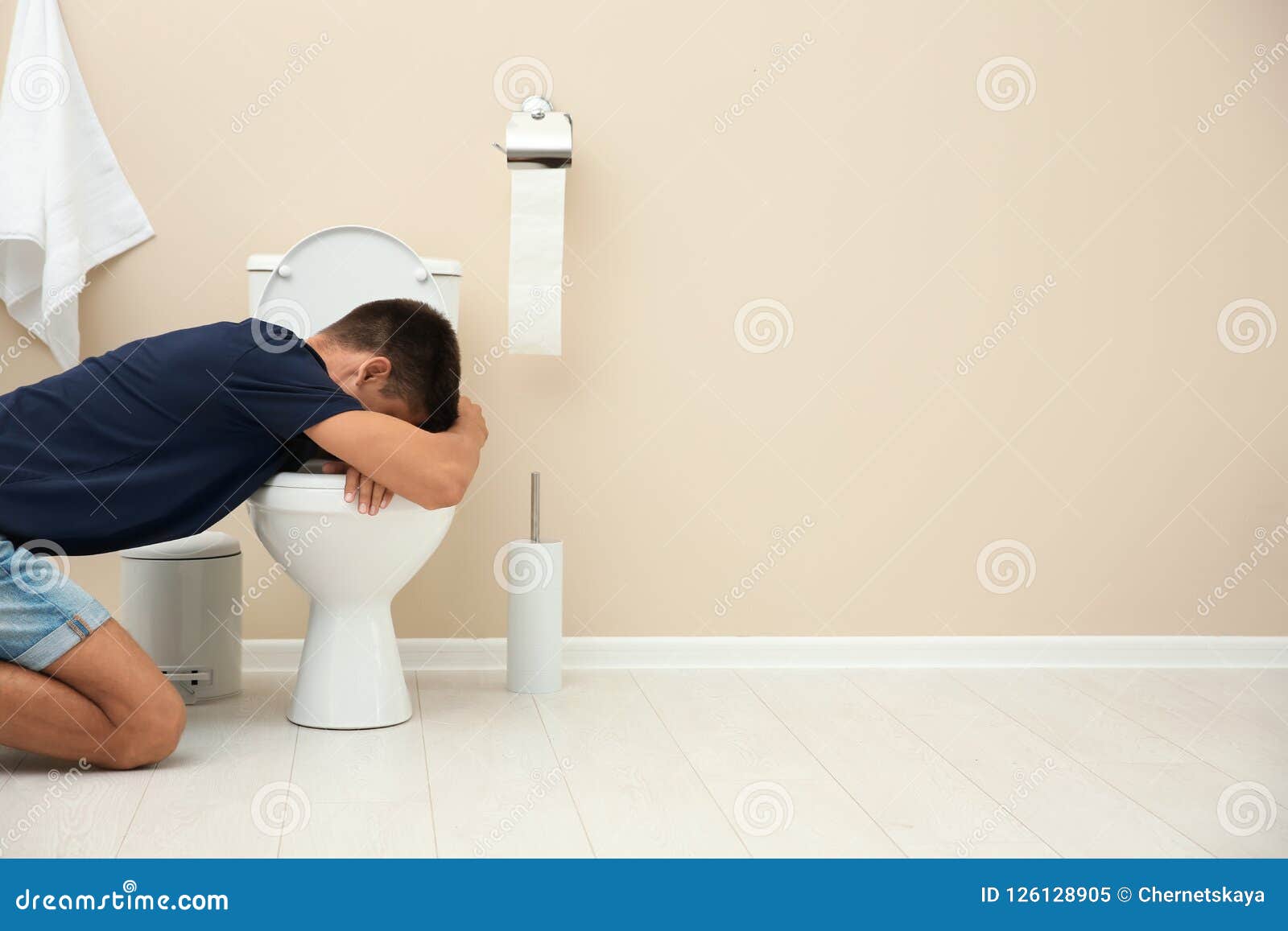 Young Man Vomiting in Toilet Bowl Stock Image - Image of care, bathroom ...