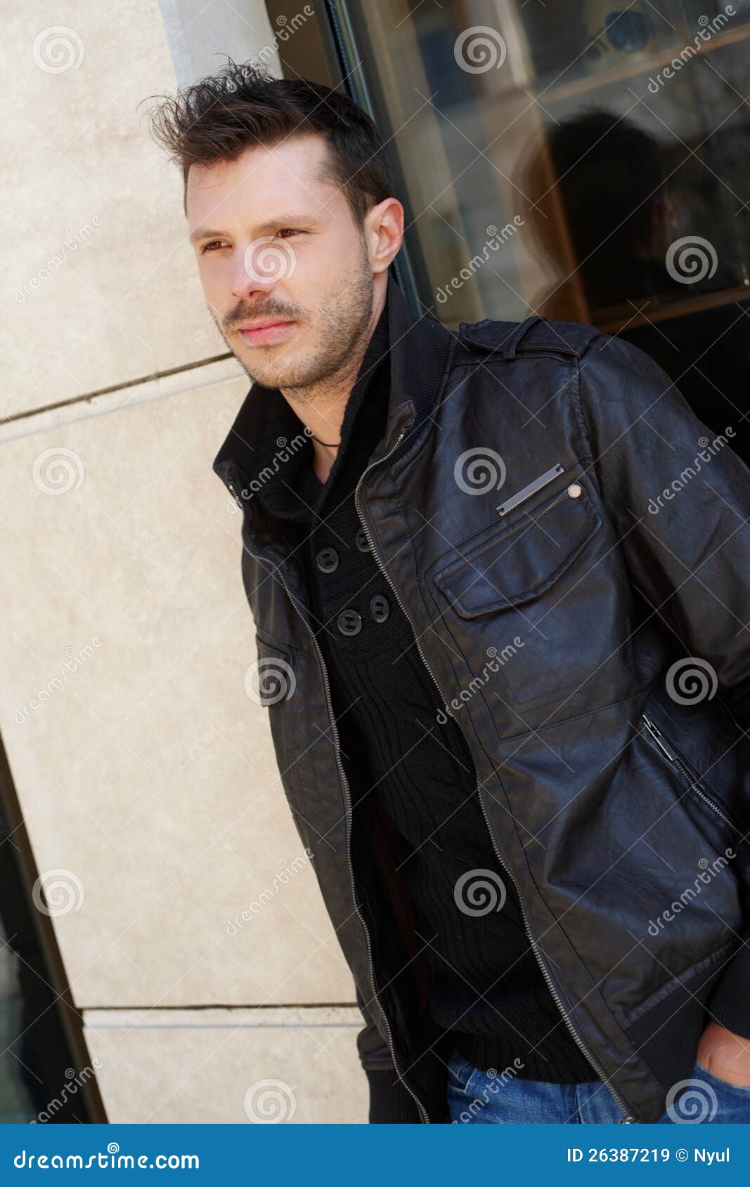 Young Man Waiting Outside Building Stock Image - Image of adult ...