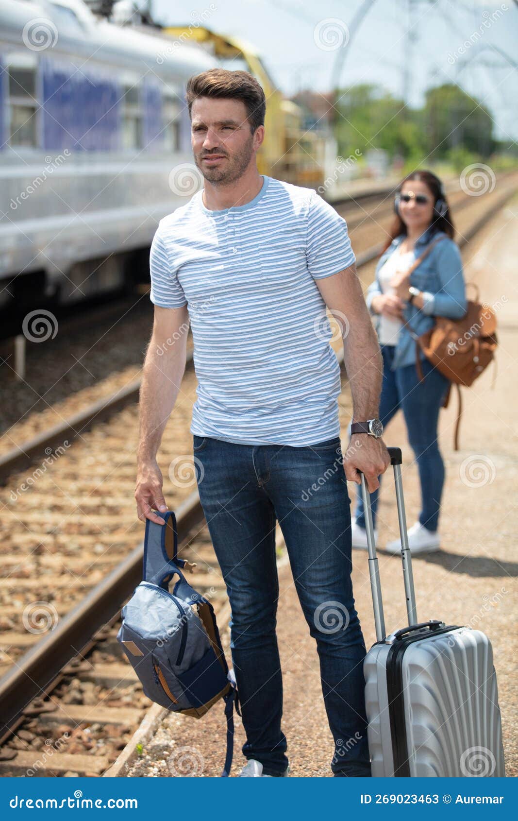 Young Man Waiting at Rail Station Platform Stock Image - Image of ...