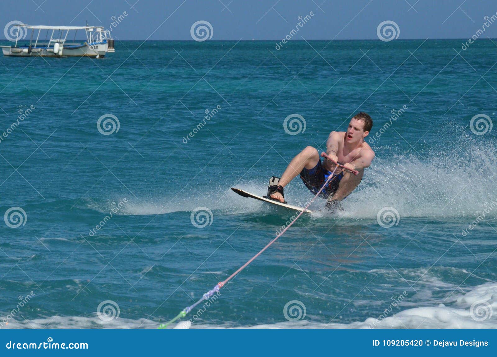 Young Man Wakeboarding and Leaning Back in a Crouch Editorial Image ...