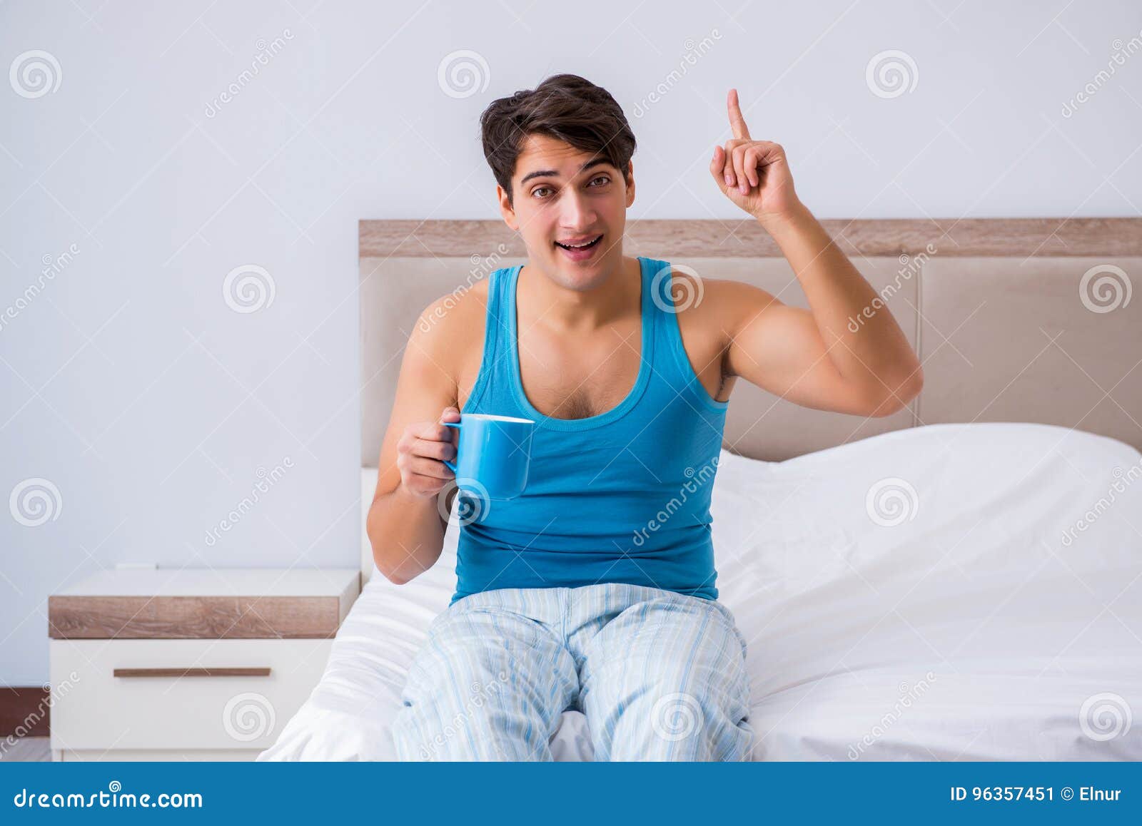 The Young Man Waking Up in Bed Stock Image - Image of awaken, clock ...