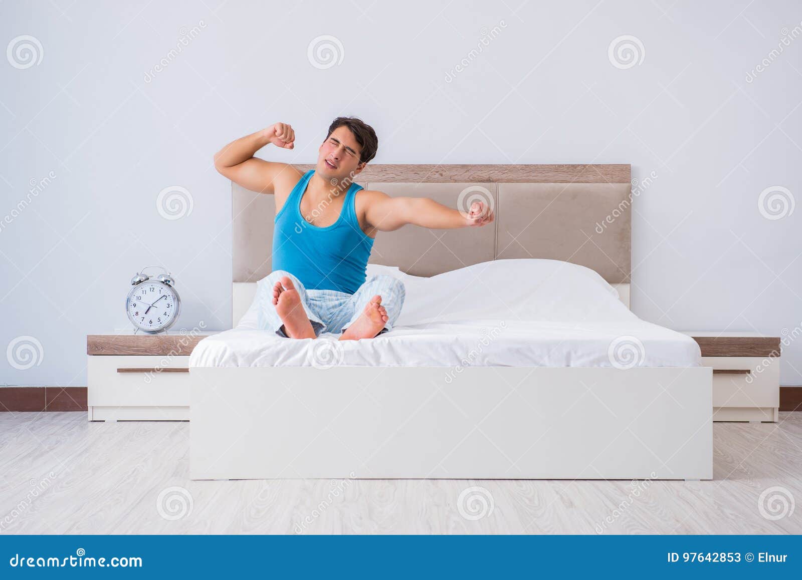 The Young Man Waking Up in Bed Stock Image - Image of home, awaken ...