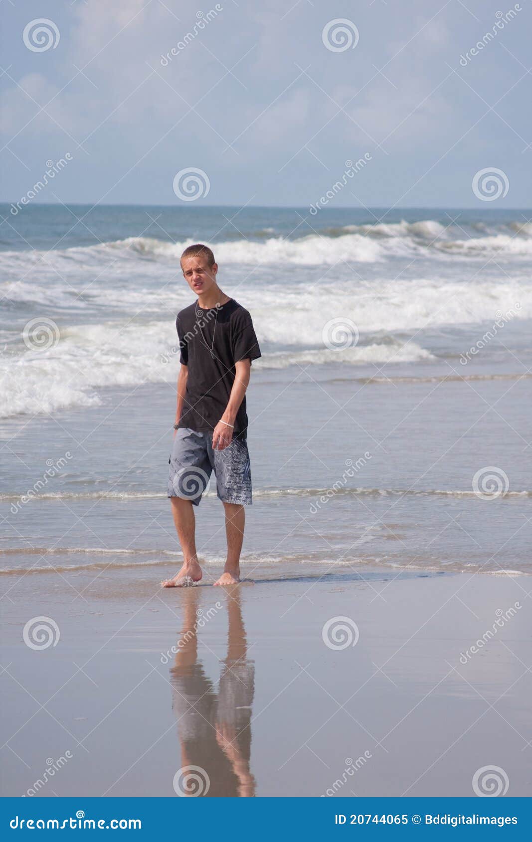 Young Man Walking stock image. Image of attractive, waves - 20744065