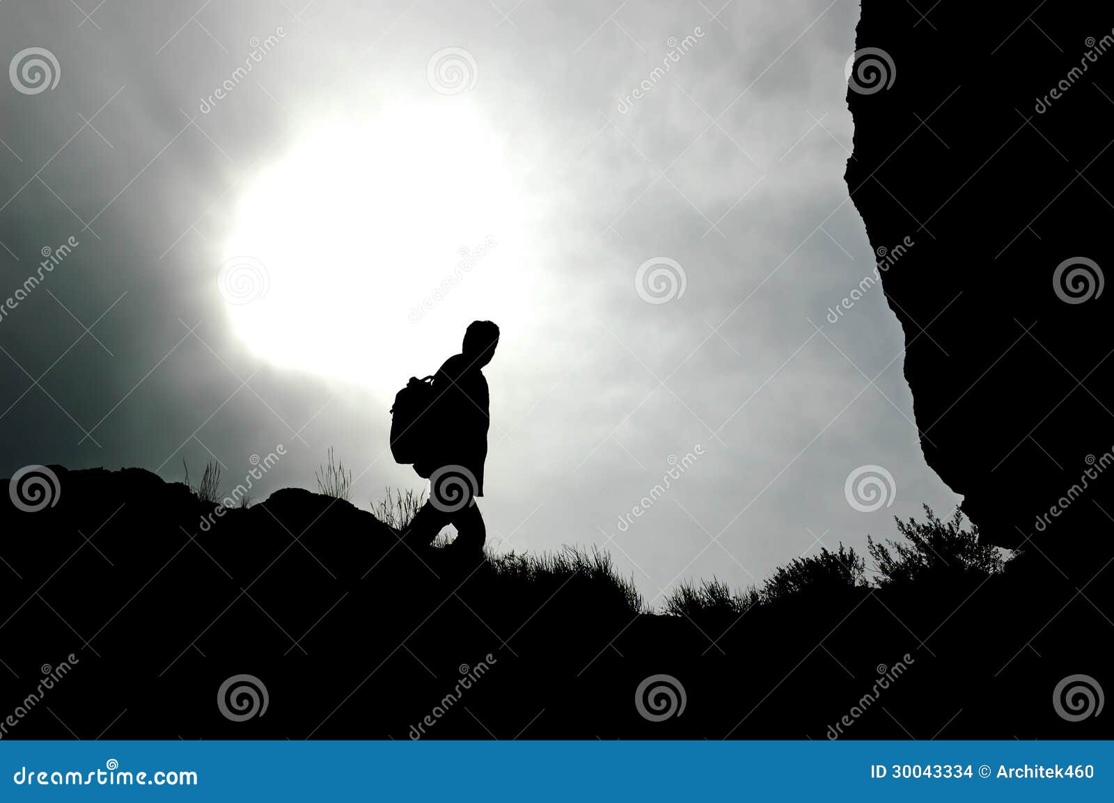 Young Man Walking on the Top of the Mountain. Stock Photo - Image of ...